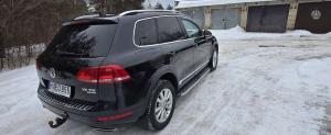 Black Volkswagen Touareg 2012 in Vilnius, with an engine capacity of 2.97 L and mileage of 273 thousand km for 13000 €, photo 5 on AUTOMOTO.COM.LV