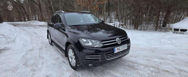 Black Volkswagen Touareg 2012 in Vilnius, with an engine capacity of 2.97 L and mileage of 273 thousand km for 13000 €, photo 7 on AUTOMOTO.COM.LV