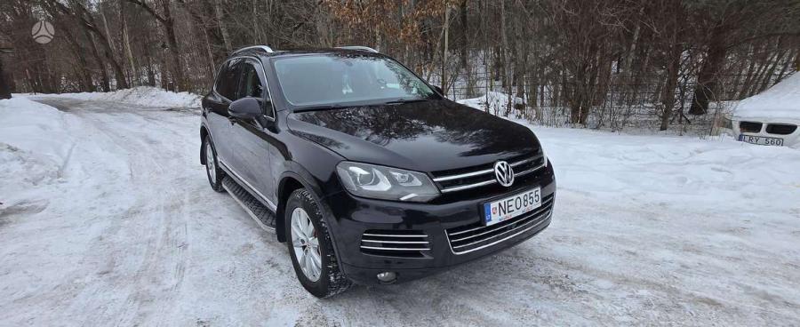 Black Volkswagen Touareg 2012 in Vilnius, with an engine capacity of 2.97 L and mileage of 273 thousand km for 13000 €, photo 7 on AUTOMOTO.COM.LV