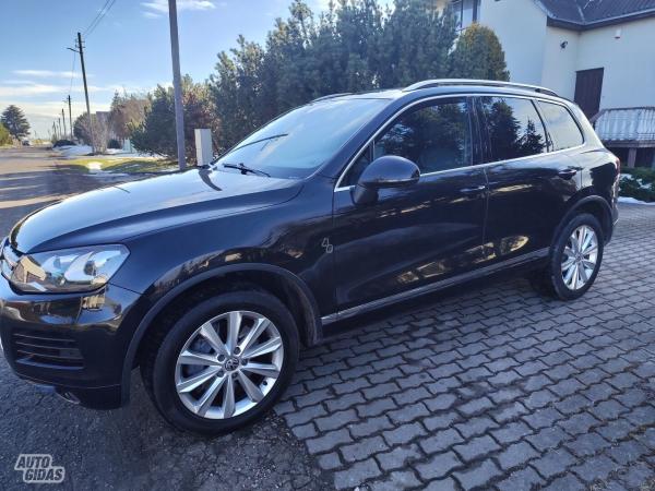 Melns Volkswagen Touareg 2012 Marijampole, ar dzinēja tilpumu 3.00 L un nobraukumu 257 tūkst. km par 11999 €, foto 2 vietnē AUTOMOTO.COM.LV
