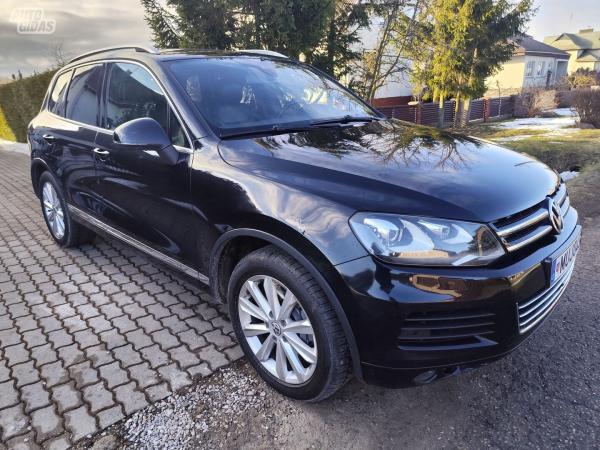 Melns Volkswagen Touareg 2012 Marijampole, ar dzinēja tilpumu 3.00 L un nobraukumu 257 tūkst. km par 11999 €, foto 10 vietnē AUTOMOTO.COM.LV