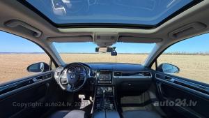 Melns Volkswagen Touareg 2012 Pērnava, ar dzinēja tilpumu 3.00 L un nobraukumu 407 tūkst. km par 10999 €, foto 12 vietnē AUTOMOTO.COM.LV