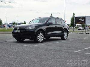 Black Volkswagen Touareg 2012 in Riga, with an engine capacity of 3.00 L and mileage of 275 thousand km for 9200 €, photo  on AUTOMOTO.COM.LV