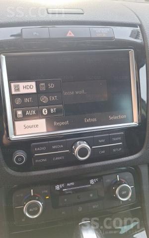 Black Volkswagen Touareg 2012 in Riga, with an engine capacity of 3.00 L and mileage of 282 thousand km for 11400 €, photo 8 on AUTOMOTO.COM.LV