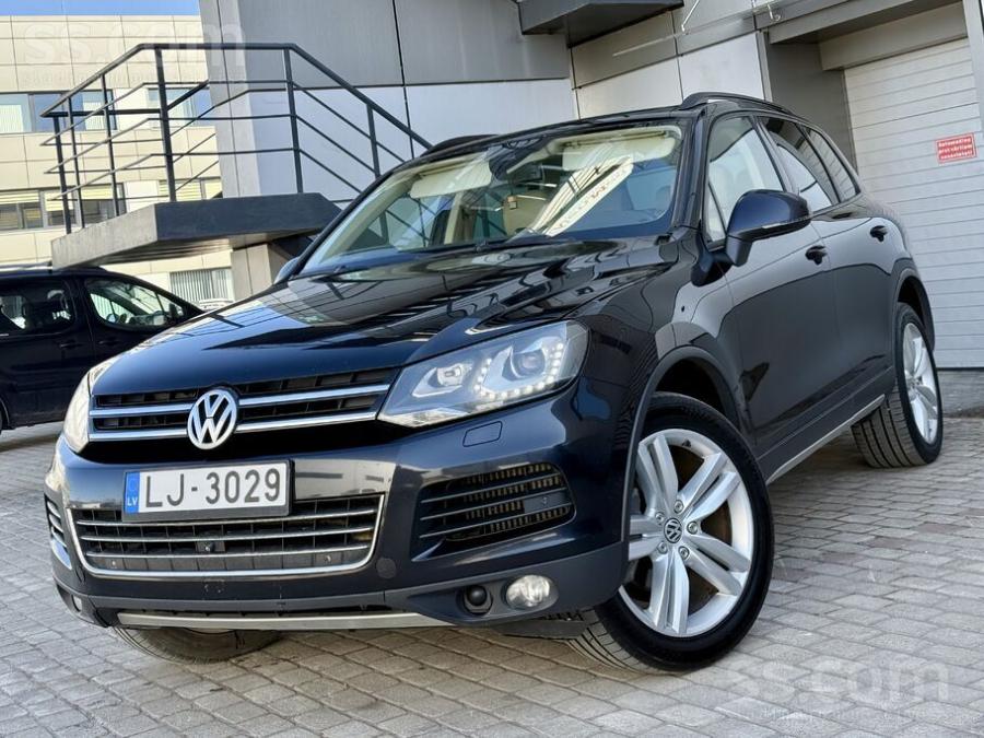 Melns Volkswagen Touareg 2012 Rīga, ar dzinēja tilpumu 3.00 L un nobraukumu 394 tūkst. km par 8350 €, foto 1 vietnē AUTOMOTO.COM.LV