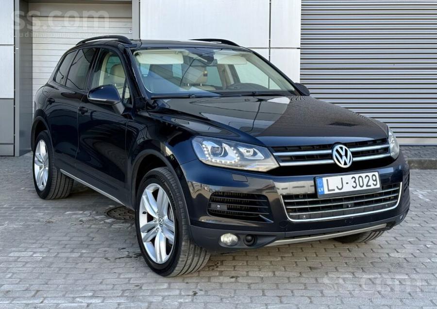 Melns Volkswagen Touareg 2012 Rīga, ar dzinēja tilpumu 3.00 L un nobraukumu 394 tūkst. km par 8350 €, foto 4 vietnē AUTOMOTO.COM.LV