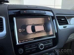 Melns Volkswagen Touareg 2012 Rīga, ar dzinēja tilpumu 3.00 L un nobraukumu 394 tūkst. km par 8350 €, foto 18 vietnē AUTOMOTO.COM.LV