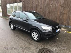 Black Volkswagen Touareg 2012 in Tallinn, with an engine capacity of 3.00 L and mileage of 245 thousand km for 10900 €, photo  on AUTOMOTO.COM.LV