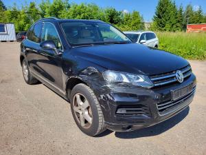 Melns Volkswagen Touareg 2012 Alīta, ar dzinēja tilpumu 3.00 L un nobraukumu 269 tūkst. km par 6650 €, foto 5 vietnē AUTOMOTO.COM.LV