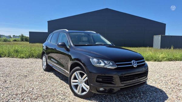 Melns Volkswagen Touareg 2012 Klaipėda, ar dzinēja tilpumu 2.97 L un nobraukumu 398 tūkst. km par 7799 €, foto 1 vietnē AUTOMOTO.COM.LV