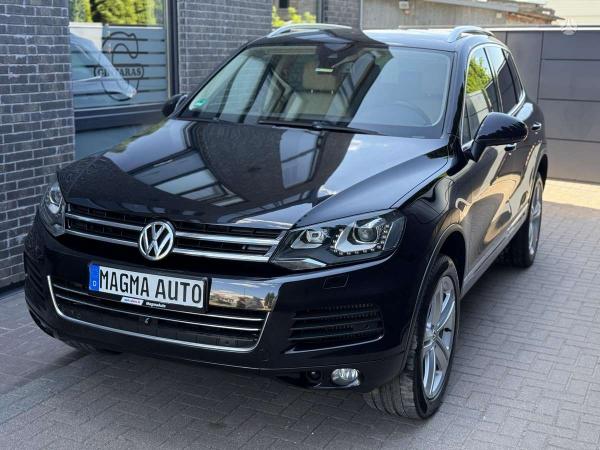 Black Volkswagen Touareg 2012 in Marijampole, with an engine capacity of 2.97 L and mileage of 278 thousand km for 13850 €, photo 3 on AUTOMOTO.COM.LV