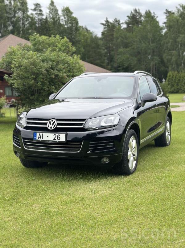 Black Volkswagen Touareg 2012 in Riga, with an engine capacity of 3.00 L and mileage of 226 thousand km for 12700 €, photo 3 on AUTOMOTO.COM.LV