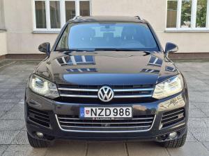 Black Volkswagen Touareg 2012 in Silute, with an engine capacity of 2.97 L and mileage of 325 thousand km for 8800 €, photo 12 on AUTOMOTO.COM.LV