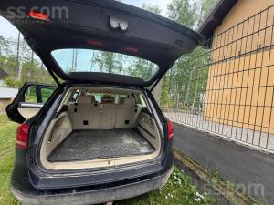 Black Volkswagen Touareg 2012 in Jurmala, with an engine capacity of 3.00 L and mileage of 293 thousand km for 9900 €, photo 10 on AUTOMOTO.COM.LV
