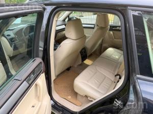 Black Volkswagen Touareg 2012 in Jurmala, with an engine capacity of 3.00 L and mileage of 293 thousand km for 9900 €, photo 11 on AUTOMOTO.COM.LV