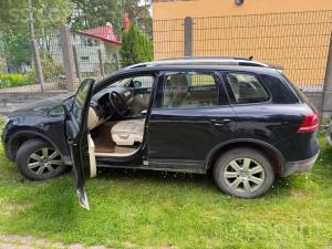 Black Volkswagen Touareg 2012 in Jurmala, with an engine capacity of 3.00 L and mileage of 293 thousand km for 9900 €, photo 14 on AUTOMOTO.COM.LV