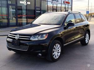 Black Volkswagen Touareg 2012 in Siauliai, with an engine capacity of 3.60 L and mileage of 180 thousand km for 8700 €, photo 3 on AUTOMOTO.COM.LV