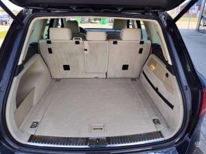 Black Volkswagen Touareg 2012 in Siauliai, with an engine capacity of 3.60 L and mileage of 180 thousand km for 8700 €, photo 25 on AUTOMOTO.COM.LV