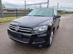 Black Volkswagen Touareg 2012 in Siauliai, with an engine capacity of 3.00 L and mileage of 251 thousand km for 9400 €, photo  on AUTOMOTO.COM.LV