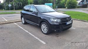 Melns Volkswagen Touareg 2012 Rīga, ar dzinēja tilpumu 3.00 L un nobraukumu 282 tūkst. km par 10400 €, foto 4 vietnē AUTOMOTO.COM.LV