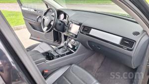 Melns Volkswagen Touareg 2012 Rīga, ar dzinēja tilpumu 3.00 L un nobraukumu 282 tūkst. km par 10400 €, foto 6 vietnē AUTOMOTO.COM.LV