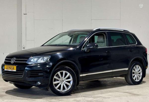 Black Volkswagen Touareg 2012 in Klaipeda, with an engine capacity of 3.60 L and mileage of 264 thousand km for 7900 €, photo 1 on AUTOMOTO.COM.LV