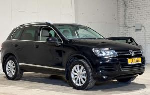 Black Volkswagen Touareg 2012 in Klaipeda, with an engine capacity of 3.60 L and mileage of 264 thousand km for 7900 €, photo 3 on AUTOMOTO.COM.LV