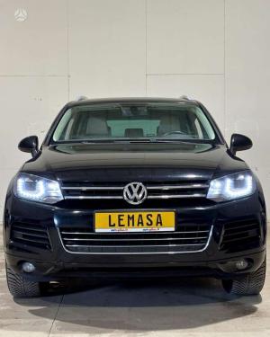 Black Volkswagen Touareg 2012 in Klaipeda, with an engine capacity of 3.60 L and mileage of 264 thousand km for 7900 €, photo 4 on AUTOMOTO.COM.LV