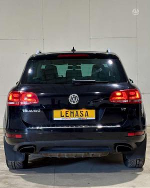 Black Volkswagen Touareg 2012 in Klaipeda, with an engine capacity of 3.60 L and mileage of 264 thousand km for 7900 €, photo 5 on AUTOMOTO.COM.LV