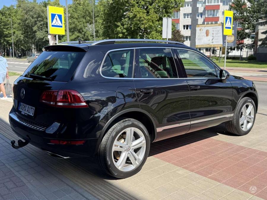 Melns Volkswagen Touareg 2012 Marijampole, ar dzinēja tilpumu 2.97 L un nobraukumu 278 tūkst. km par 13250 €, foto 13 vietnē AUTOMOTO.COM.LV