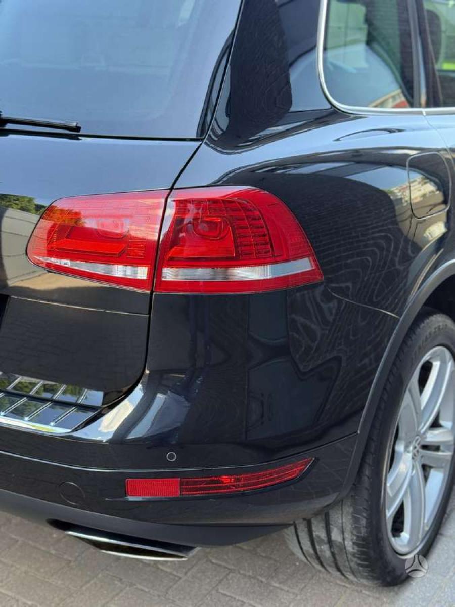 Melns Volkswagen Touareg 2012 Marijampole, ar dzinēja tilpumu 2.97 L un nobraukumu 278 tūkst. km par 13250 €, foto 15 vietnē AUTOMOTO.COM.LV