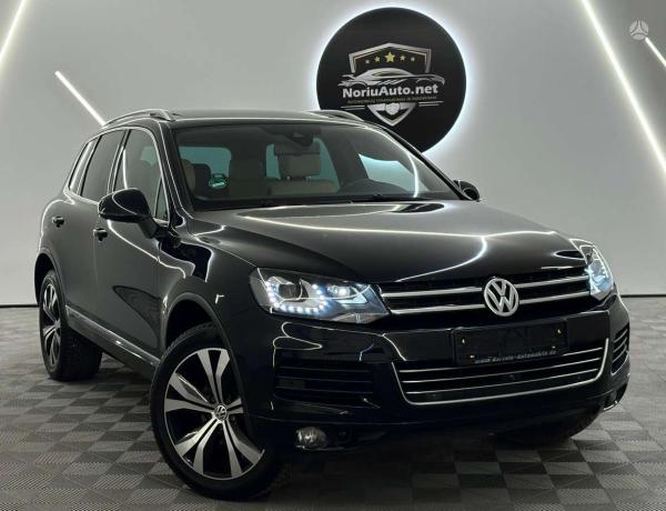 Black Volkswagen Touareg 2012 in Marijampole, with an engine capacity of 2.97 L and mileage of 326 thousand km for 11999 €, photo 1 on AUTOMOTO.COM.LV