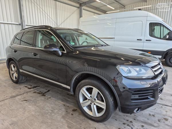 Melns Volkswagen Touareg 2012 Viļņa, ar dzinēja tilpumu 3.00 L un nobraukumu 225 tūkst. km par 10200 €, foto 1 vietnē AUTOMOTO.COM.LV