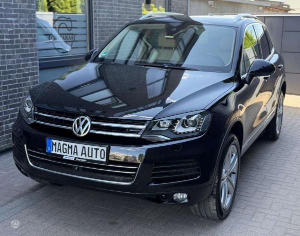 Black Volkswagen Touareg 2012 in Marijampole, with an engine capacity of 2.97 L and mileage of 278 thousand km for 13250 €, photo 7 on AUTOMOTO.COM.LV
