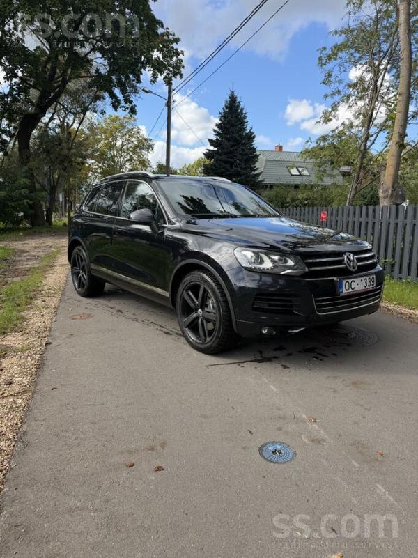 Melns Volkswagen Touareg 2012 Rīga, ar dzinēja tilpumu 3.00 L un nobraukumu 308 tūkst. km par 11850 €, foto 4 vietnē AUTOMOTO.COM.LV