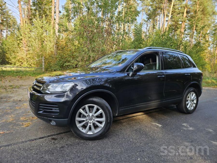 Black Volkswagen Touareg 2012 in Riga, with an engine capacity of 3.00 L and mileage of 250 thousand km for 11250 €, photo 10 on AUTOMOTO.COM.LV