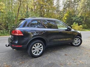 Black Volkswagen Touareg 2012 in Riga, with an engine capacity of 3.00 L and mileage of 250 thousand km for 11250 €, photo 13 on AUTOMOTO.COM.LV