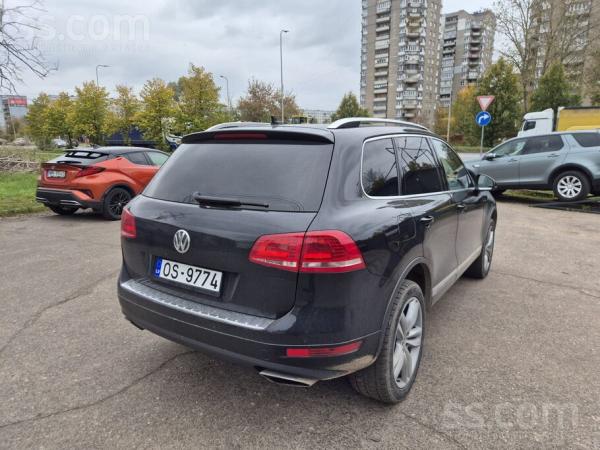 Melns Volkswagen Touareg 2012 Rīga, ar dzinēja tilpumu 3.00 L un nobraukumu 227 tūkst. km par 8990 €, foto 7 vietnē AUTOMOTO.COM.LV
