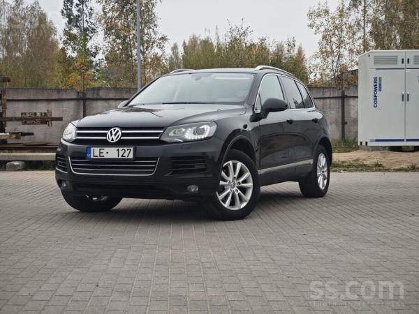 Melns Volkswagen Touareg 2012 Rīga, ar dzinēja tilpumu 3.00 L un nobraukumu 164 tūkst. km par 16000 €, foto 1 vietnē AUTOMOTO.COM.LV