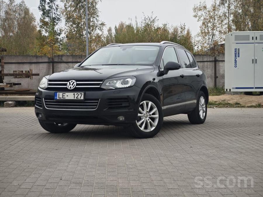 Black Volkswagen Touareg 2012 in Riga, with an engine capacity of 3.00 L and mileage of 164 thousand km for 16000 €, photo 1 on AUTOMOTO.COM.LV