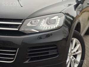 Black Volkswagen Touareg 2012 in Riga, with an engine capacity of 3.00 L and mileage of 164 thousand km for 16000 €, photo 3 on AUTOMOTO.COM.LV