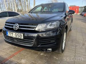 Melns Volkswagen Touareg 2013 Rīga, ar dzinēja tilpumu 3.00 L un nobraukumu 312 tūkst. km par 11100 €, foto 1 vietnē AUTOMOTO.COM.LV
