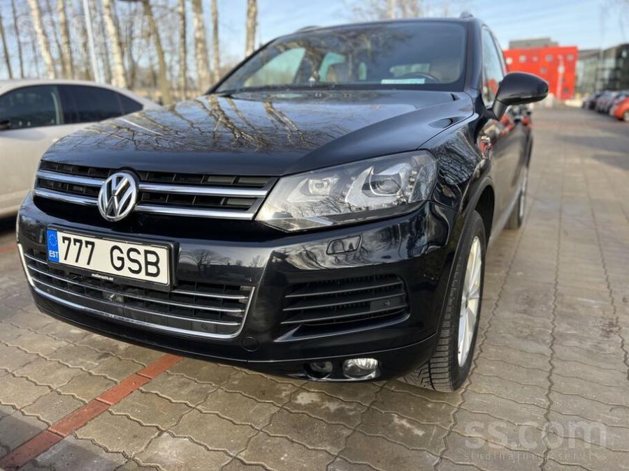 Melns Volkswagen Touareg 2013 Rīga, ar dzinēja tilpumu 3.00 L un nobraukumu 312 tūkst. km par 11100 €, foto 1 vietnē AUTOMOTO.COM.LV