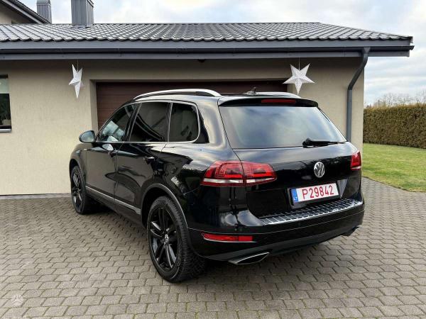 Black Volkswagen Touareg 2013 in Kedainiai, with an engine capacity of 2.97 L and mileage of 274 thousand km for 12250 €, photo 10 on AUTOMOTO.COM.LV