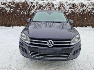 Black Volkswagen Touareg 2013 in Vilnius, with an engine capacity of 2.97 L and mileage of 215 thousand km for 13350 €, photo 2 on AUTOMOTO.COM.LV