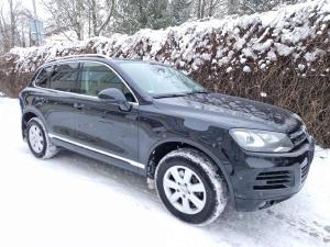 Black Volkswagen Touareg 2013 in Vilnius, with an engine capacity of 2.97 L and mileage of 215 thousand km for 13350 €, photo 3 on AUTOMOTO.COM.LV