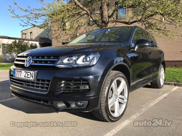 Black Volkswagen Touareg 2013 in Tallinn, with an engine capacity of 3.00 L and mileage of 275 thousand km for 13800 €, photo 1 on AUTOMOTO.COM.LV