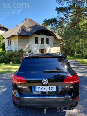 Melns Volkswagen Touareg 2013 Rīga, ar dzinēja tilpumu 3.00 L un nobraukumu 385 tūkst. km par 8790 €, foto 6 vietnē AUTOMOTO.COM.LV