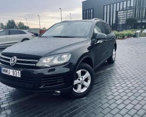 Black Volkswagen Touareg 2013 in Vilnius, with an engine capacity of 2.97 L and mileage of 294 thousand km for 9200 €, photo  on AUTOMOTO.COM.LV