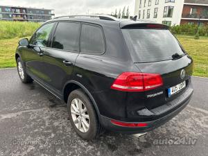 Melns Volkswagen Touareg 2013 Tallina, ar dzinēja tilpumu 3.00 L un nobraukumu 282 tūkst. km par 10999 €, foto 3 vietnē AUTOMOTO.COM.LV